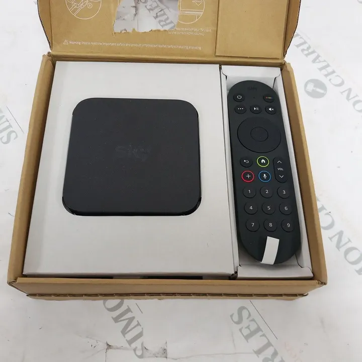 BOXED SKY STREAM TV PUCK STREAMING BOX 4510672-Simon Charles Auctioneers